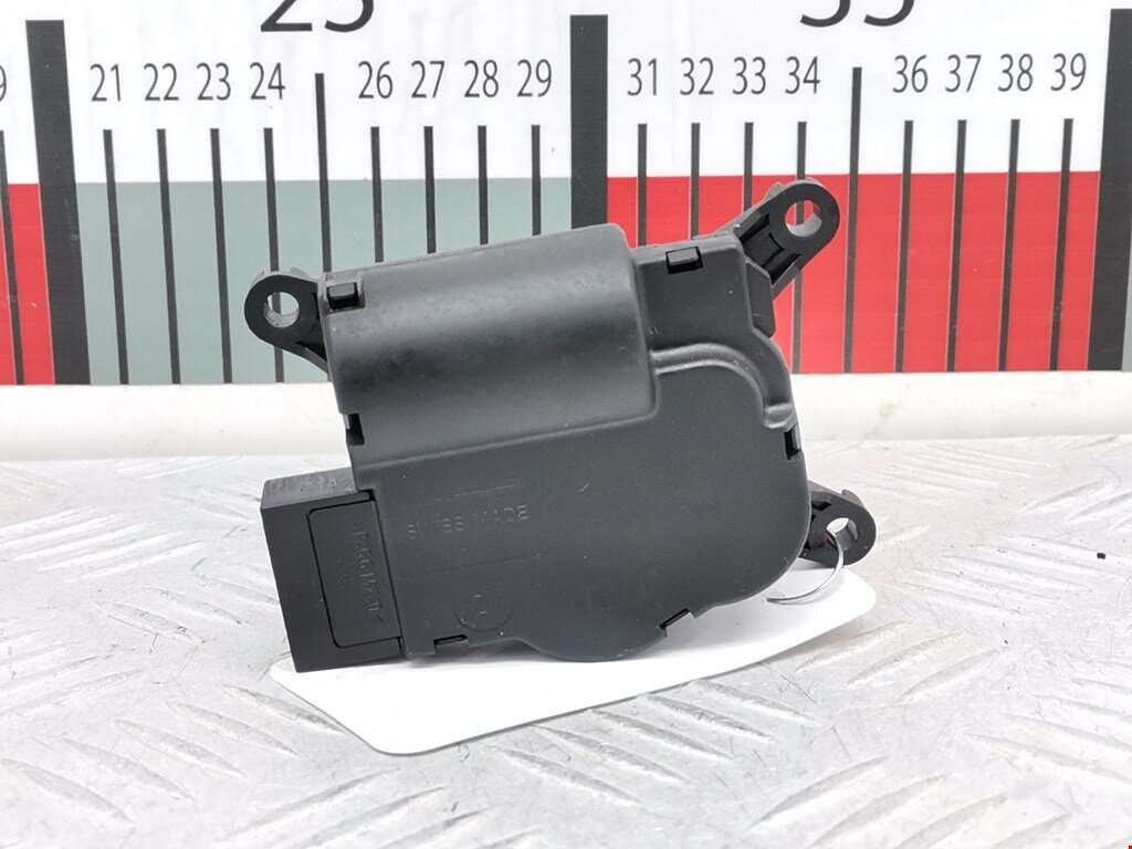 Сервопривод (электропривод моторчик привода) заслонки печки Opel Astra H 52406339 арт. 2016934