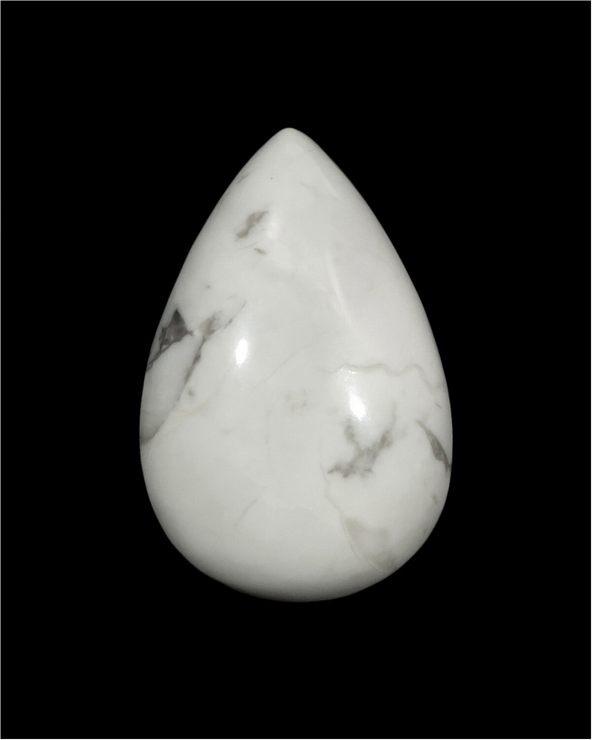 Магнезит, кабошон из минерала, размер: 31х20х7 мм, натуральный камень.