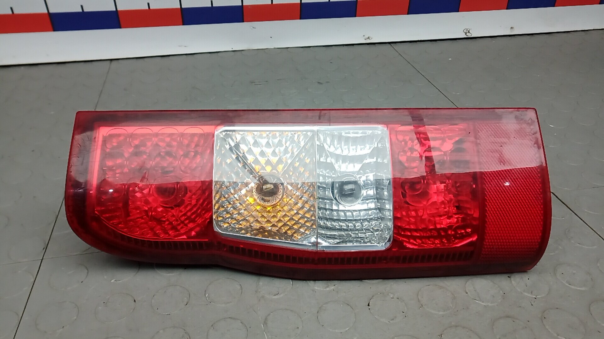 Фонарь задний левый FORD TRANSIT 7