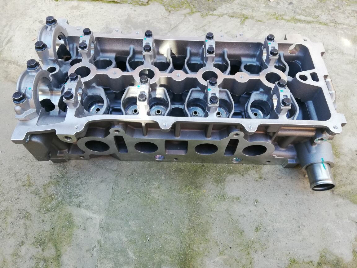 Головка блока цилиндров голая Geely Emgrand X7 [2.0 16V 6AT внедорожник] 1016050975