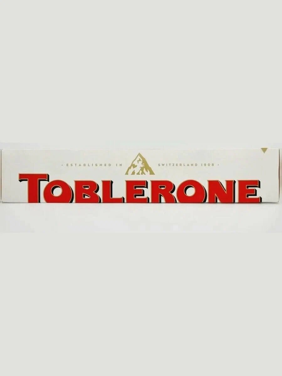 Шоколад Toblerone белый с медово-миндальной нугой, 100 гр. (Швейцария)