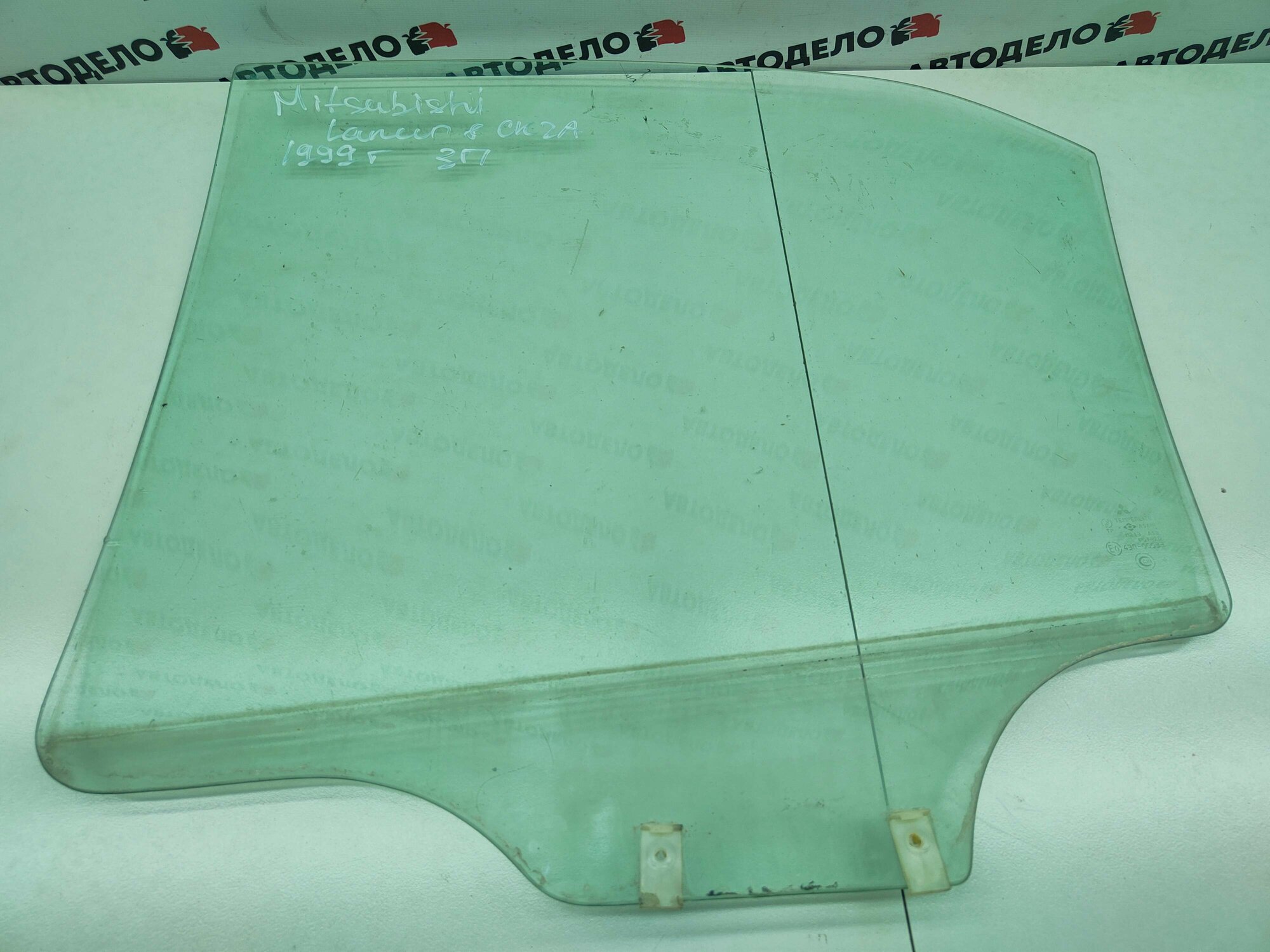 Стекло двери заднее правое Mitsubishi Lancer 8