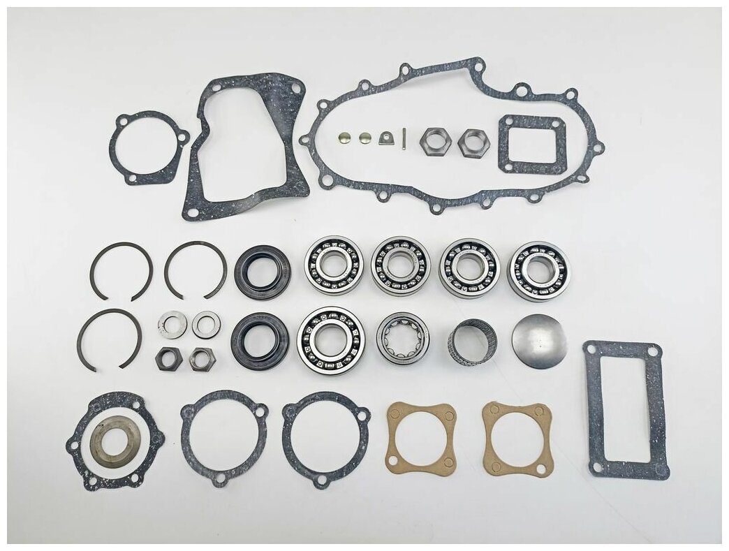 Ремкомплект косозубой раздаточной коробки а/м УАЗ (прокладки, подшипники, сальники)
