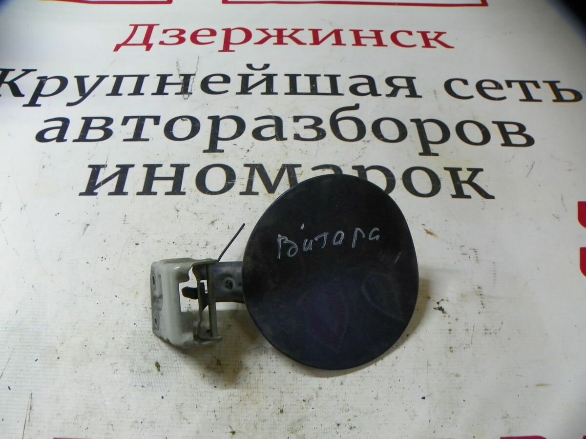 Лючок бензобака Suzuki Grand Vitara II (2005—2008) 6432064J00