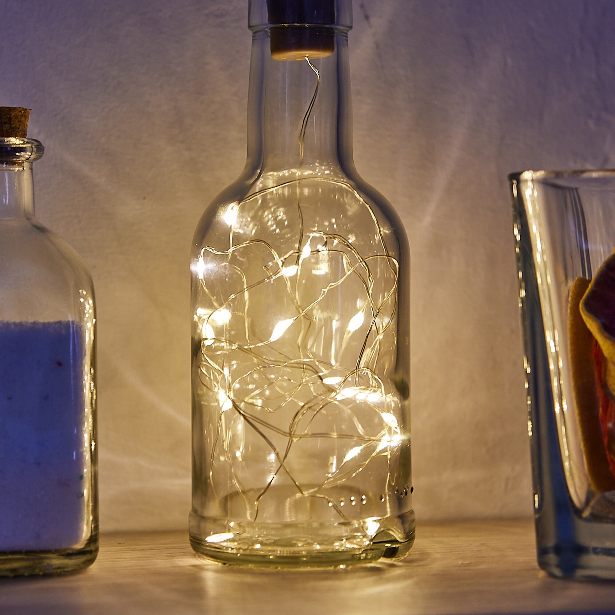 Гирлянда светодиодная Роса с пробкой, 2 м, IP20, на батарейках 3xLR44в-к, теплый белый свет, Uniel