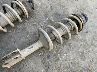 Стойка амортизатора Renault Logan 1 поколение [рестайлинг] K7J 1.4 2012 перед. лев. (б/у)