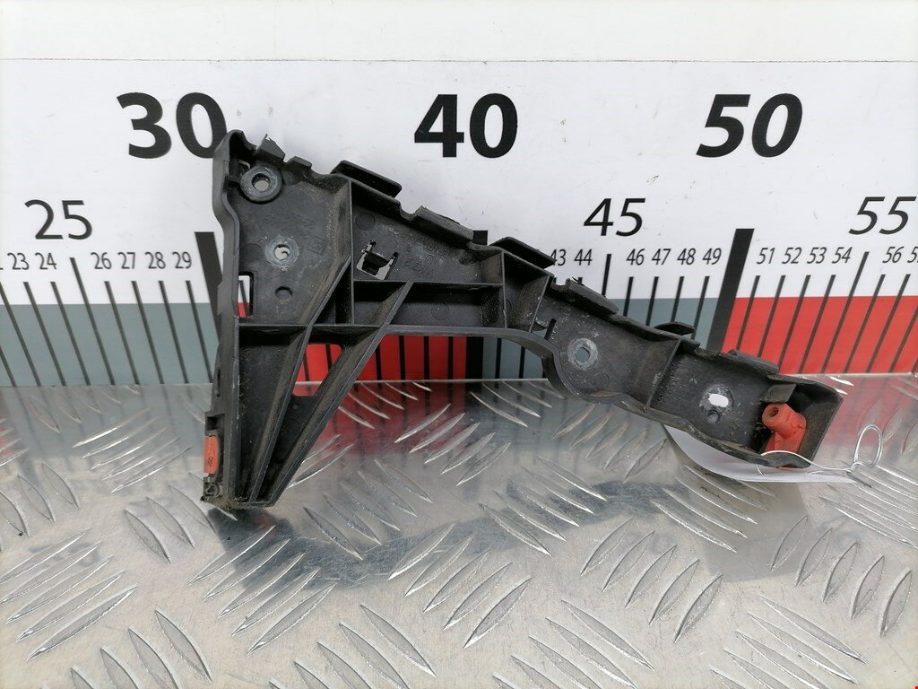 Кронштейн (крепление) переднего бампера левый Opel Astra H 24460283 арт. 1957687