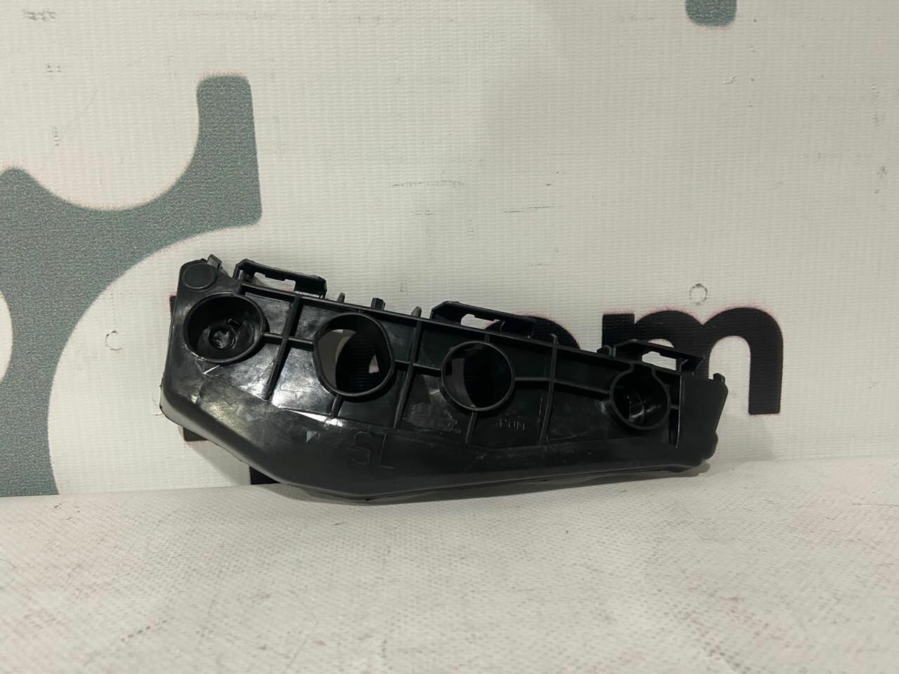 Брекет (кронштейн) бампера переднего левый Toyota Corolla E150 10-13