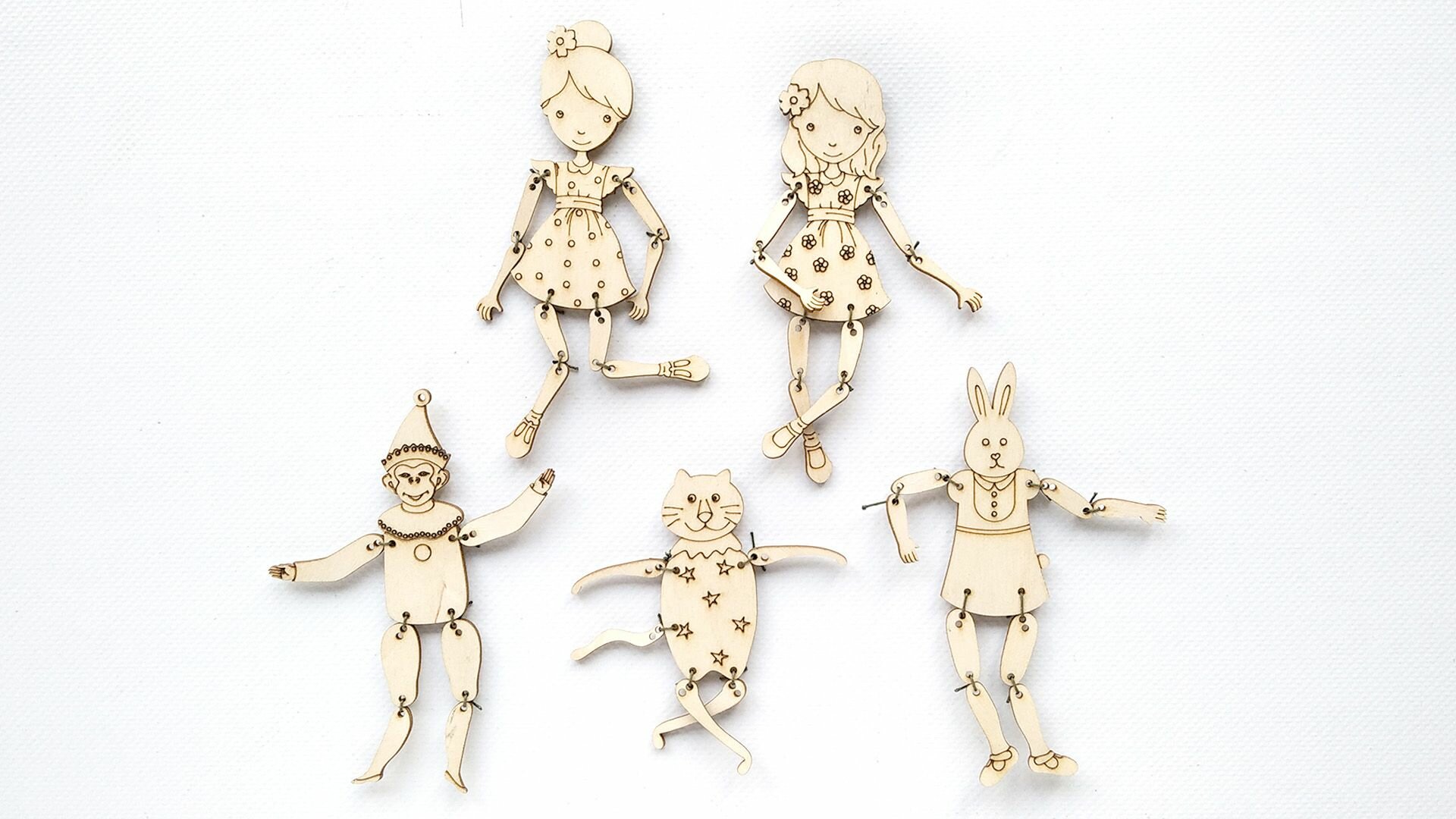 Игрушки дергунчики