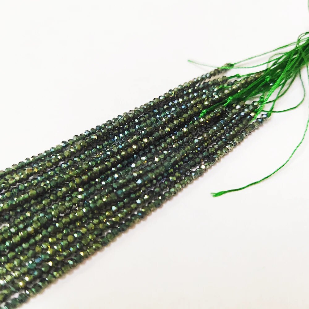 Граненые хрустальные бусины Rondelle 1,5*2 мм Nailsworld Изумрудный, Transparent green