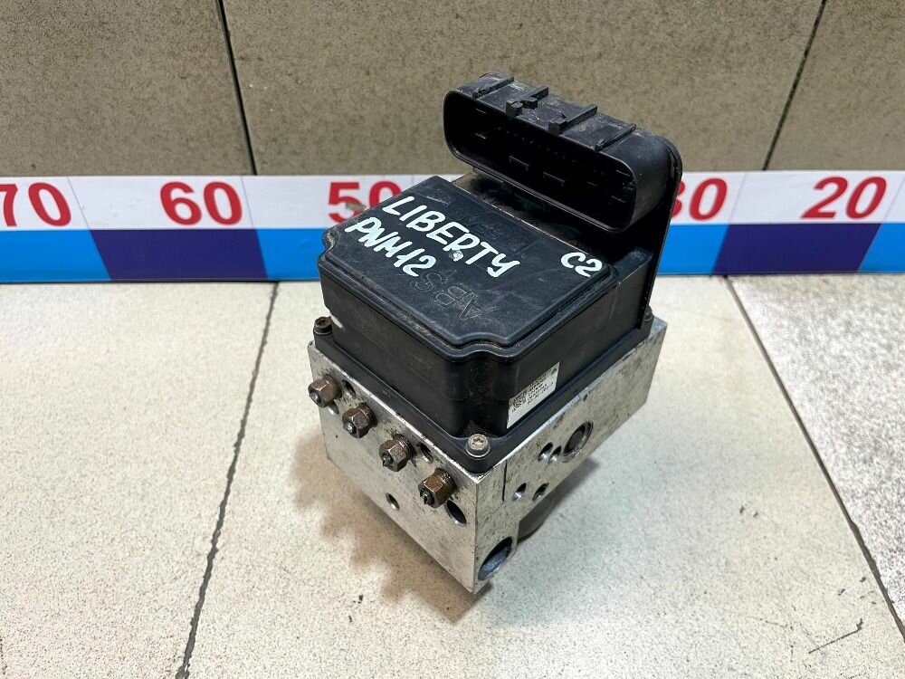 Блок Abs (насос) Nissan Liberty 47660WF401