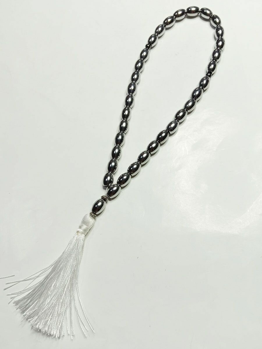 Четки из серебристого гематита в форме бочка, общая длина 17см. толщина 7 мм. ширина 9 мм.