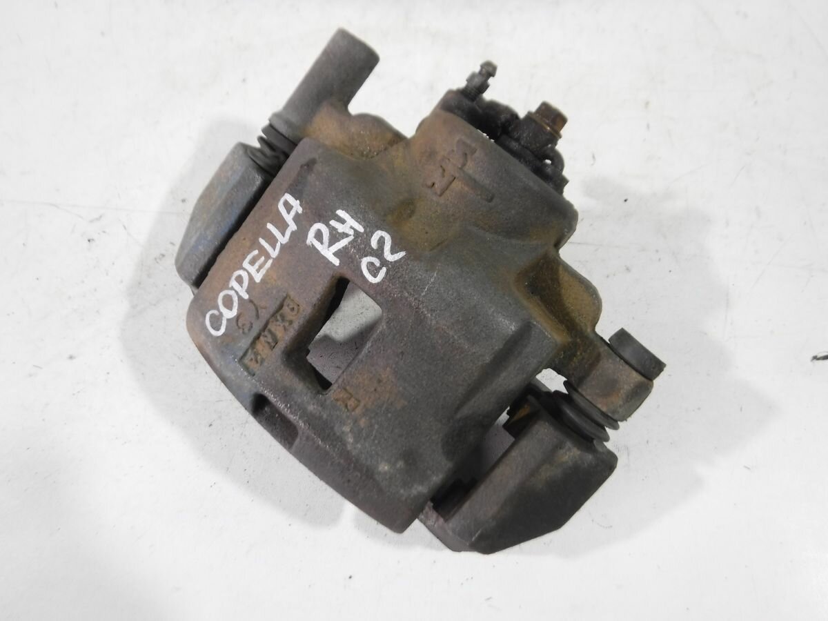 Суппорт тормозной передний правый Mazda Capella CG (1994—1997) G02K33980