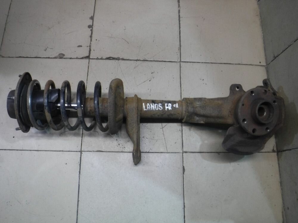 Стойка амортизатора переднего Chevrolet Lanos I 96445027