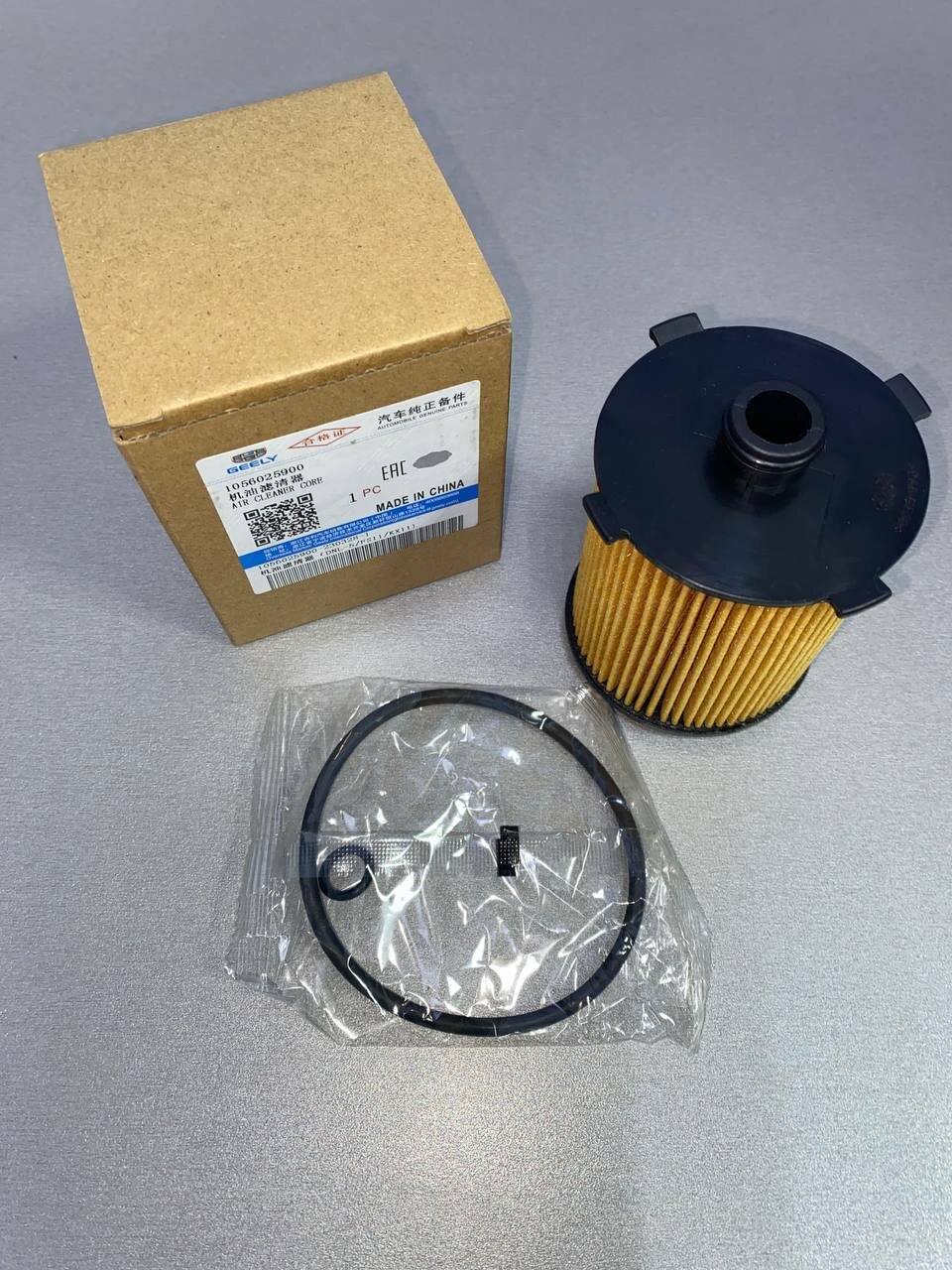 Масляный фильтр Оригинал Geely Tugella 1056025900