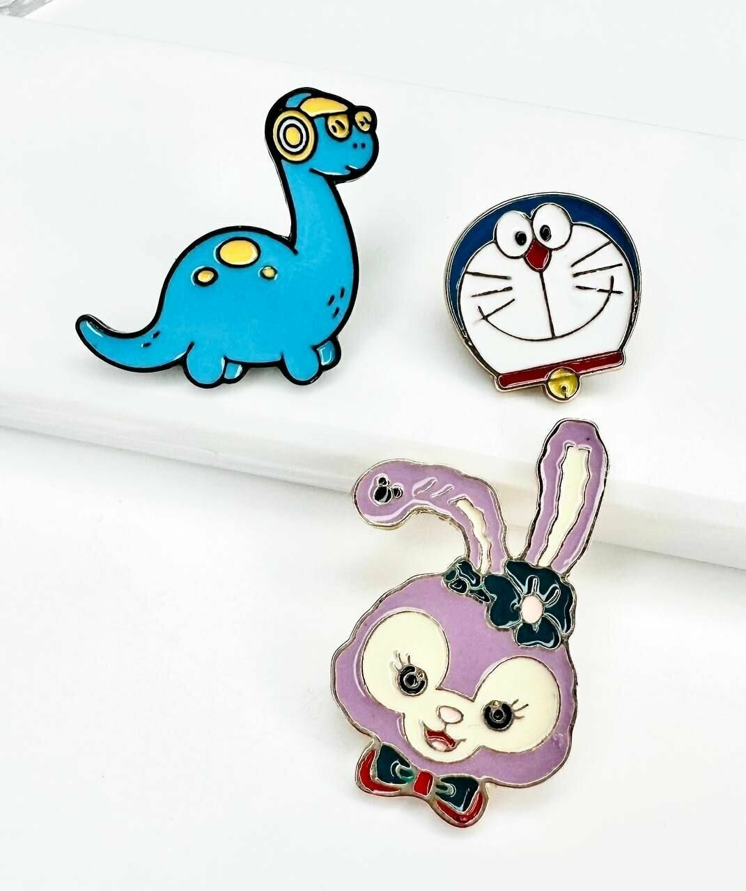 Комплект брошей