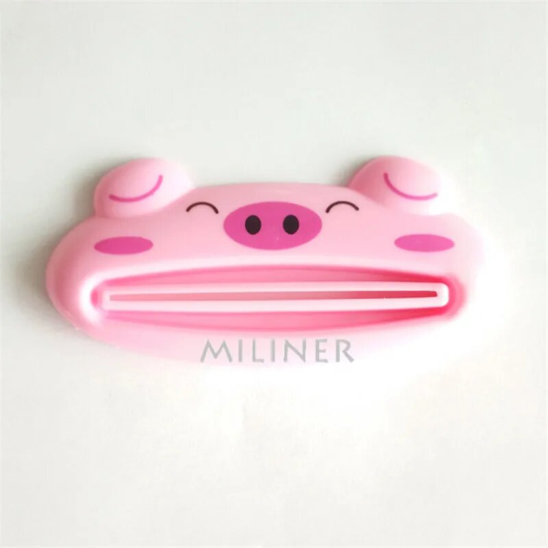 Розовый диспенсер для зубной пасты в виде свинки Pig