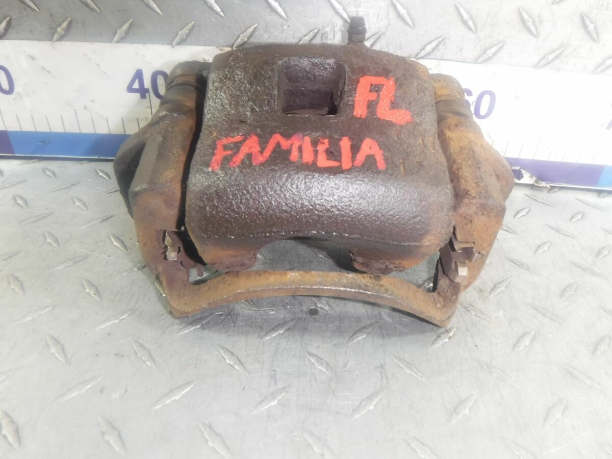 Суппорт тормозной передний левый Mazda Familia BJ (1998—2004) B2ZD3399Z