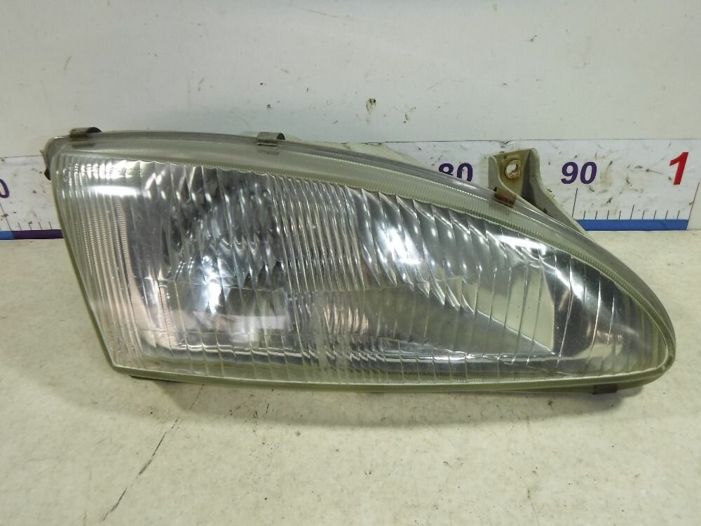 Фара правая Hyundai Elantra II 9210229000