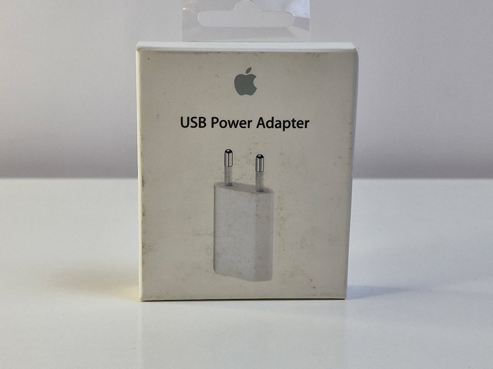 Сетевое зарядное устройство Apple USB Power Adapter USB 1A белый (MGN13ZM/A)