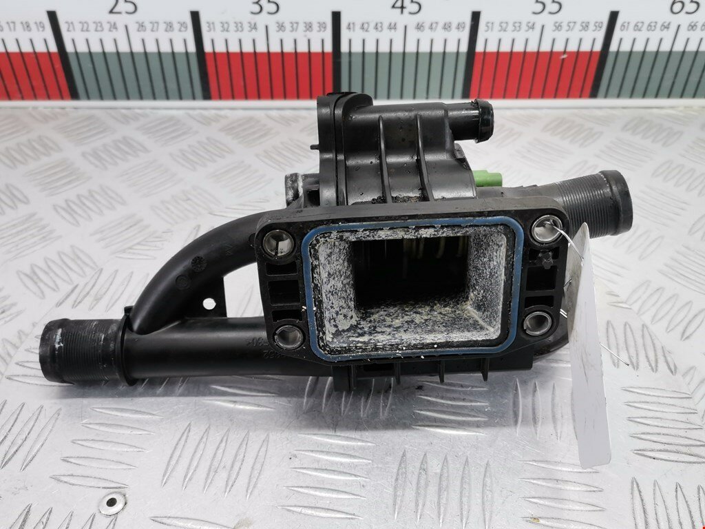 Корпус термостата Peugeot Partner 1 1336AF арт. 1999311