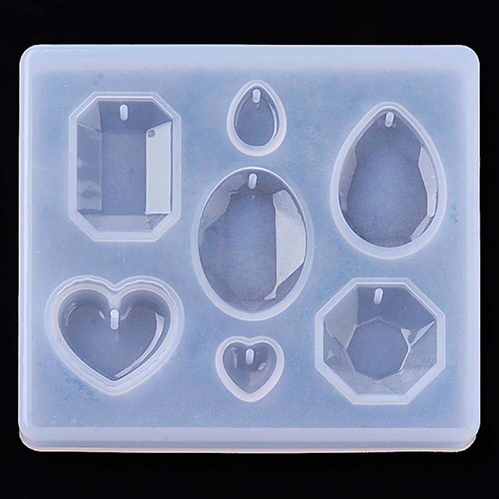 Молд силиконовый 0009695 для эпоксидной смолы 7 Кулонов 9х8х0.8 см, цена за 1 шт.