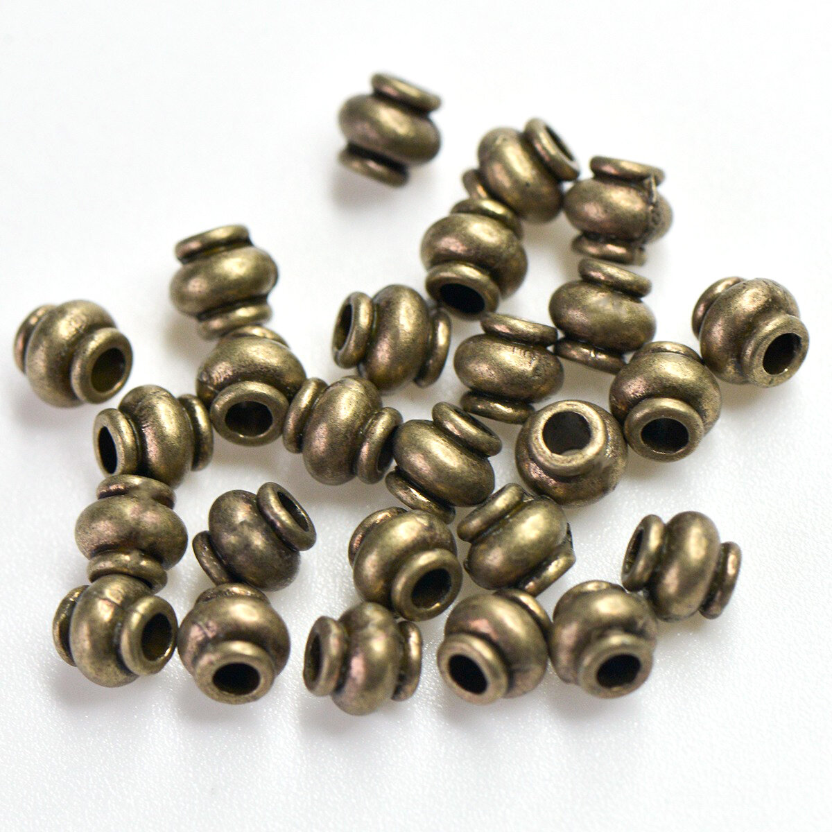 Разделитель для бусин ок.150 шт. / спейсер, 4.5 мм, цвет античная бронза