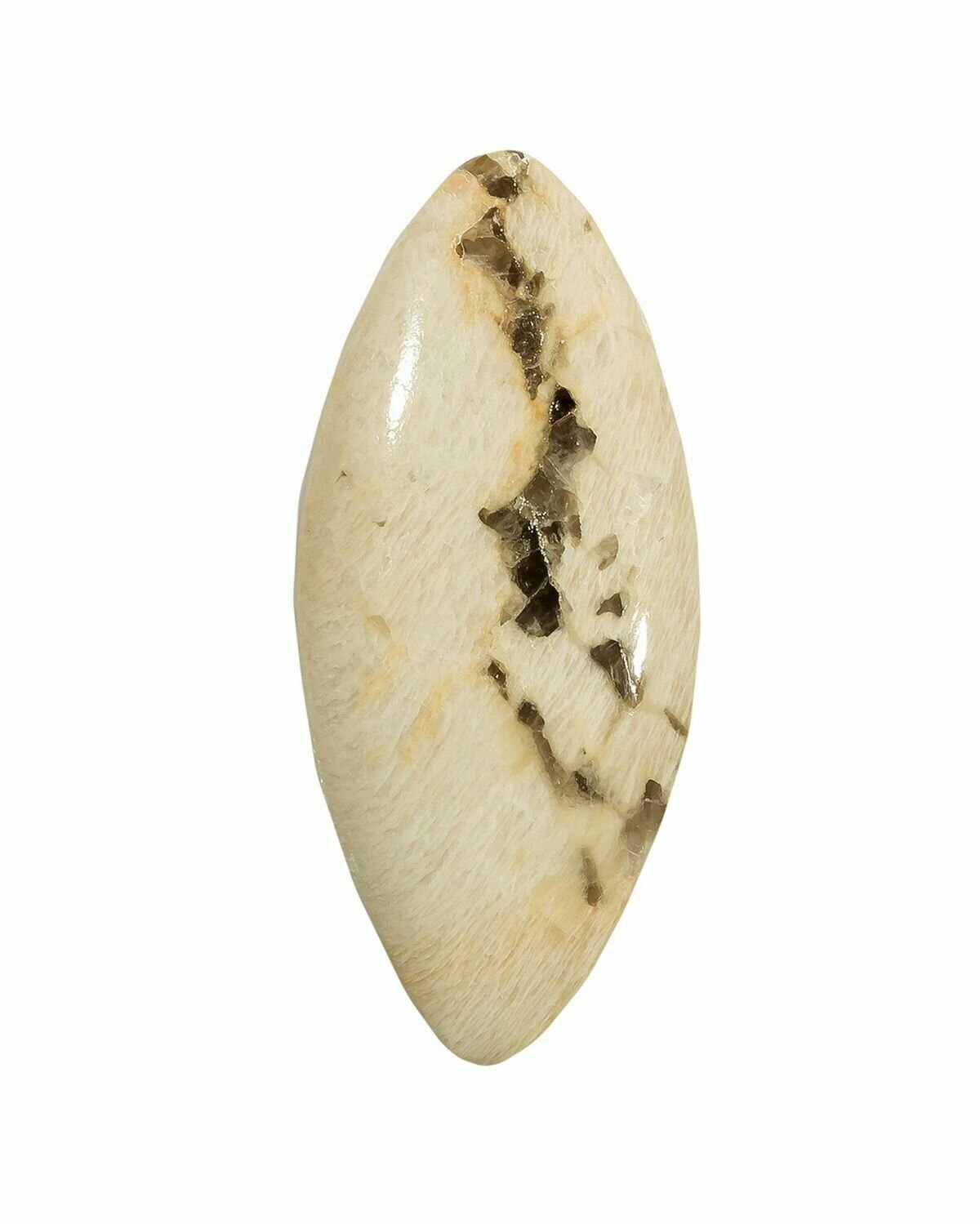 Кабошон из пегматита размером 50х22х6 мм.