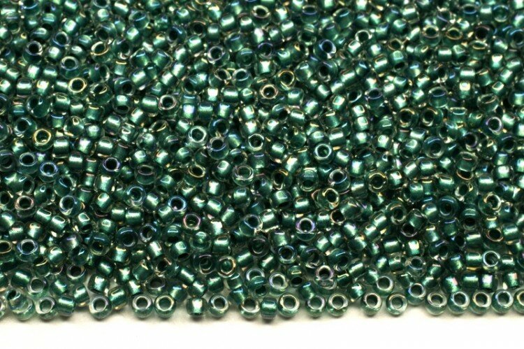 Бисер японский TOHO круглый 15/0 #0264 хрусталь/изумруд радужный, окрашенный изнутри, 10 грамм