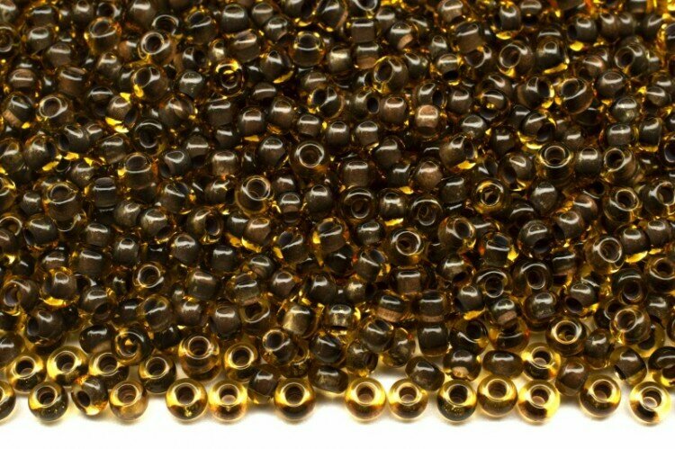 Бисер чешский PRECIOSA круглый 10/0 10021 янтарный прозрачный, коричневая линия внутри, 1 сорт, 50г