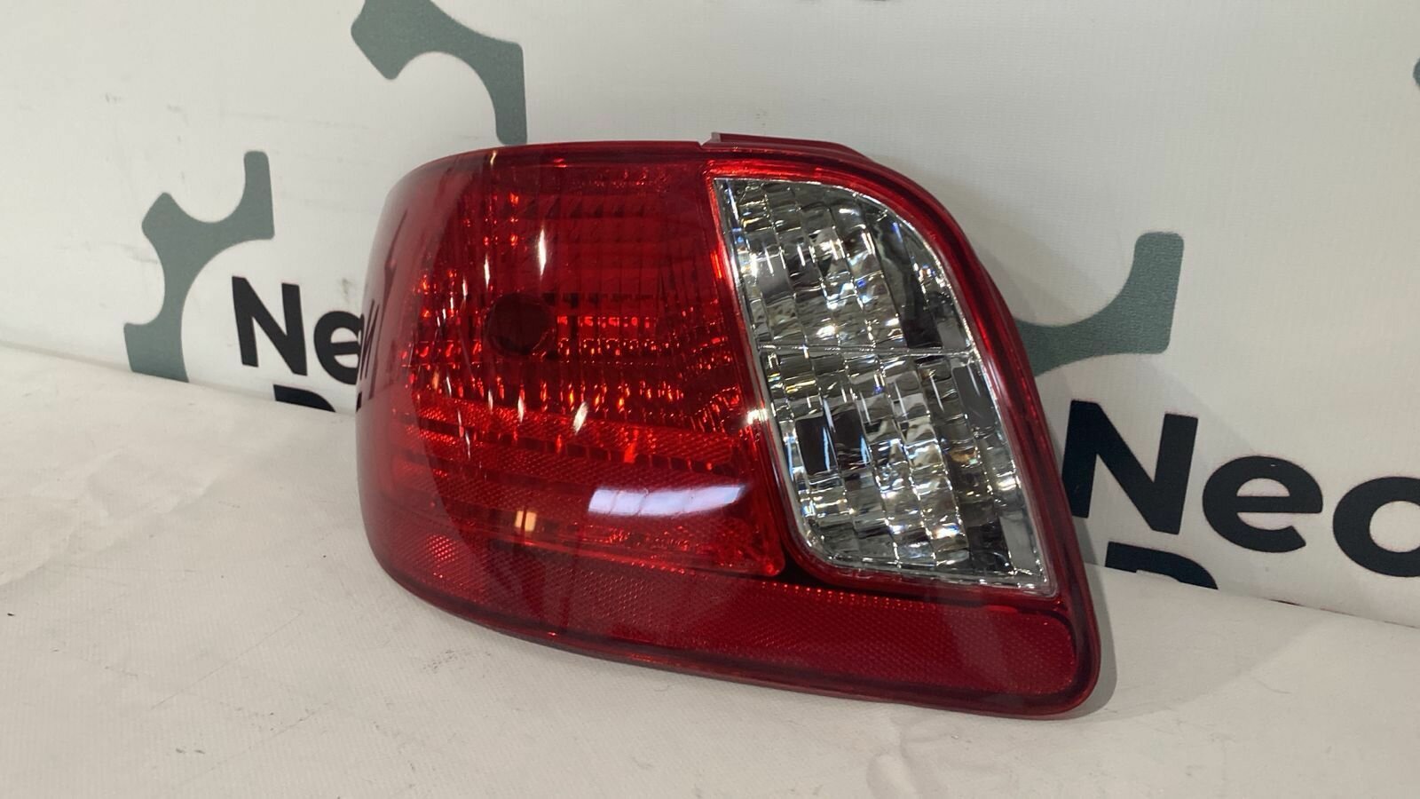Фонарь Kia Rio 2 JB задний, левый, наружный, новый, аналог, 05-09