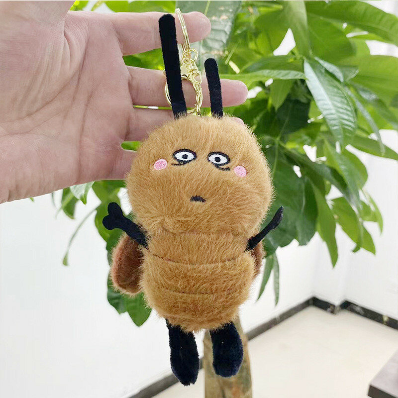 Quirky cute plush keychain doll with playful cockroach design for kids backpacks