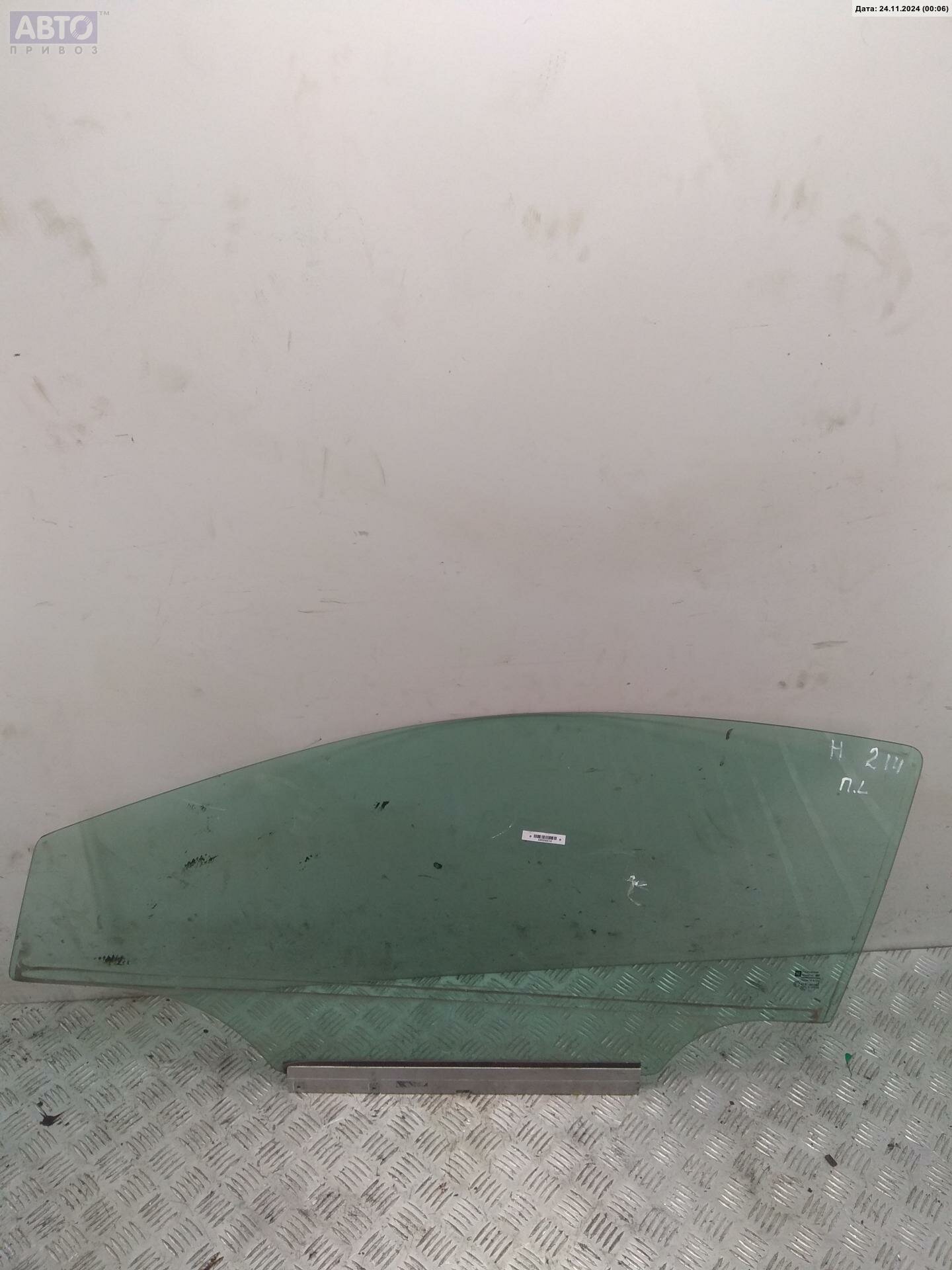 Стекло двери передней левой Opel Astra H (2004-2009)