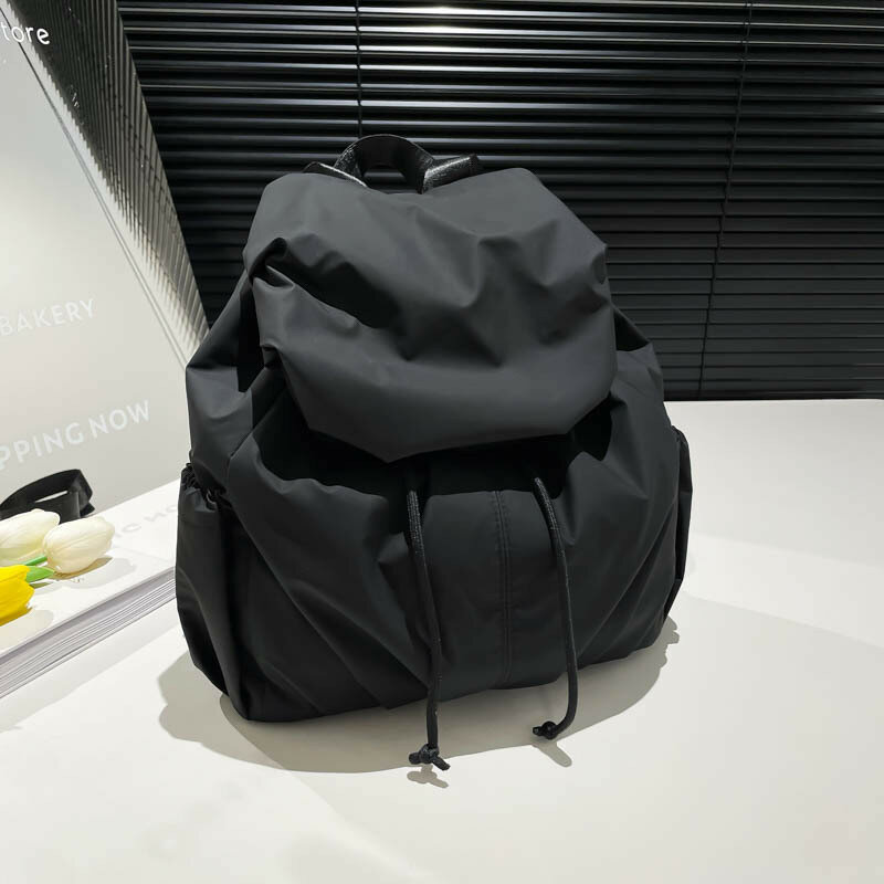 Travel backpack nylon women durable solid color with concealed zipper storage and soft structure