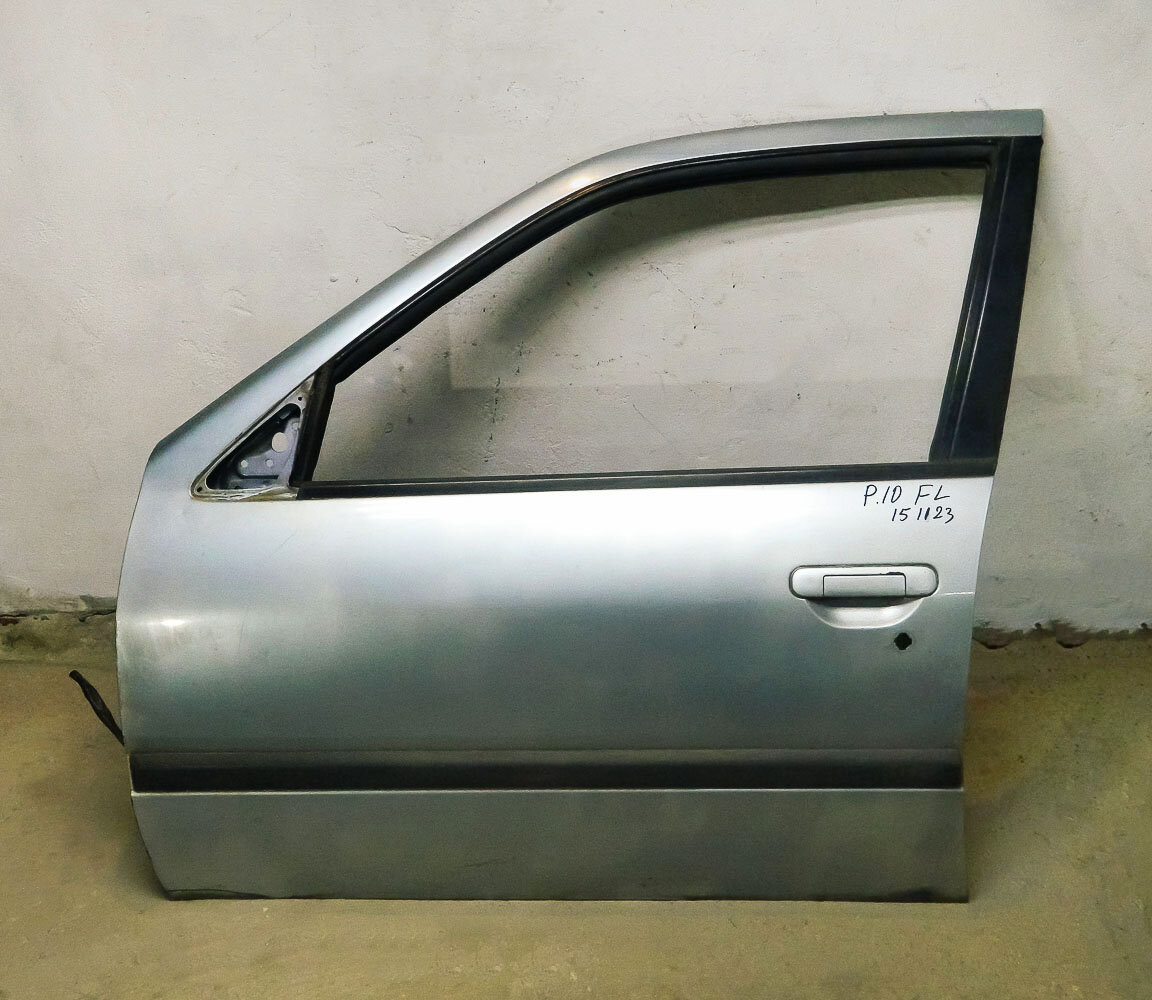 Дверь передняя левая Primera P10