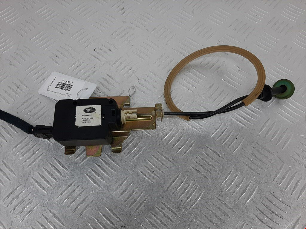 Сервопривод (электропривод моторчик привода) лючка бензобака Land Rover Range Rover Sport 1 FSG500030 арт. 1702415