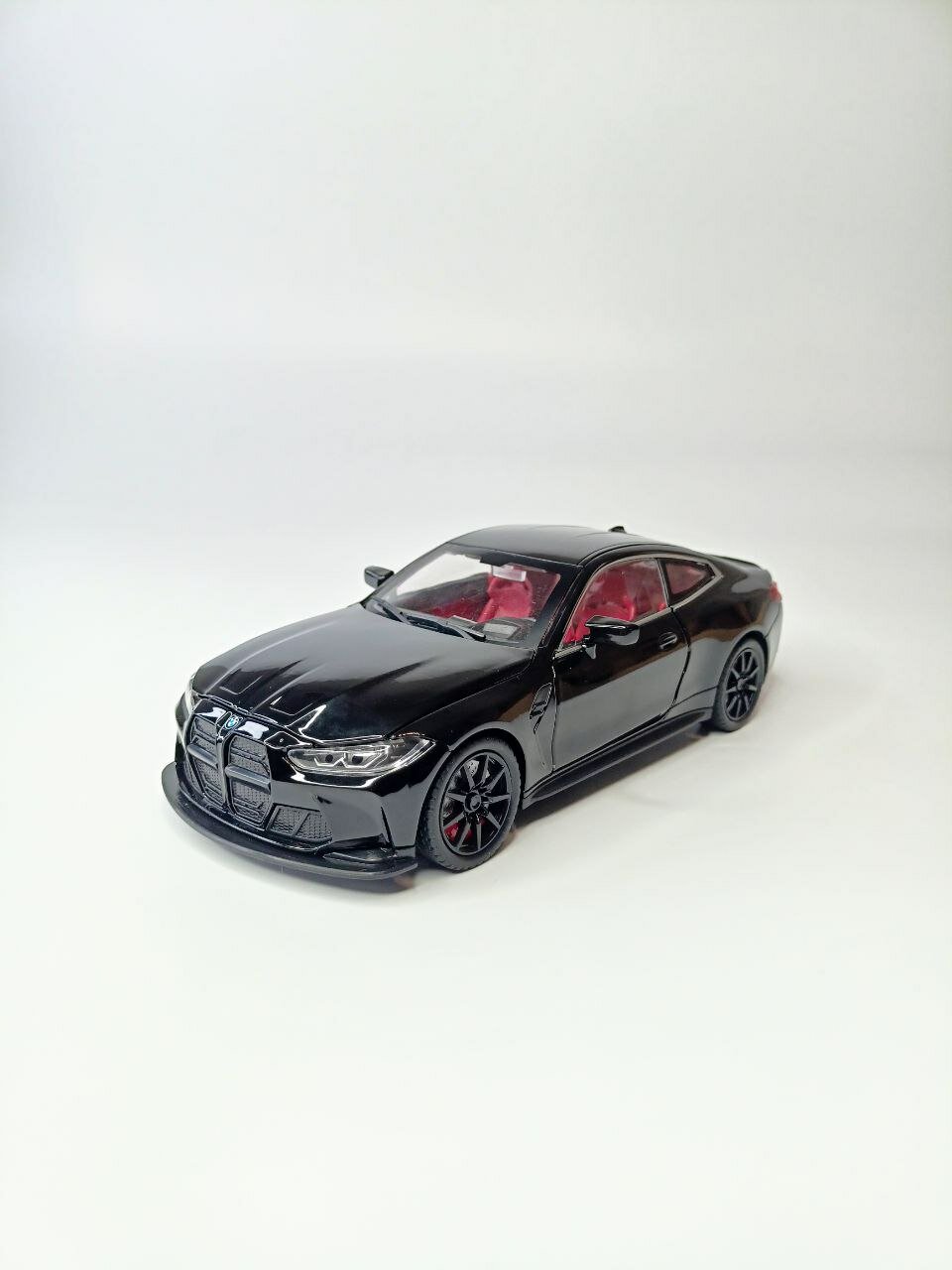 Модель автомобиля BMW M4 коллекционная металлическая игрушка масштаб 1:24 черный