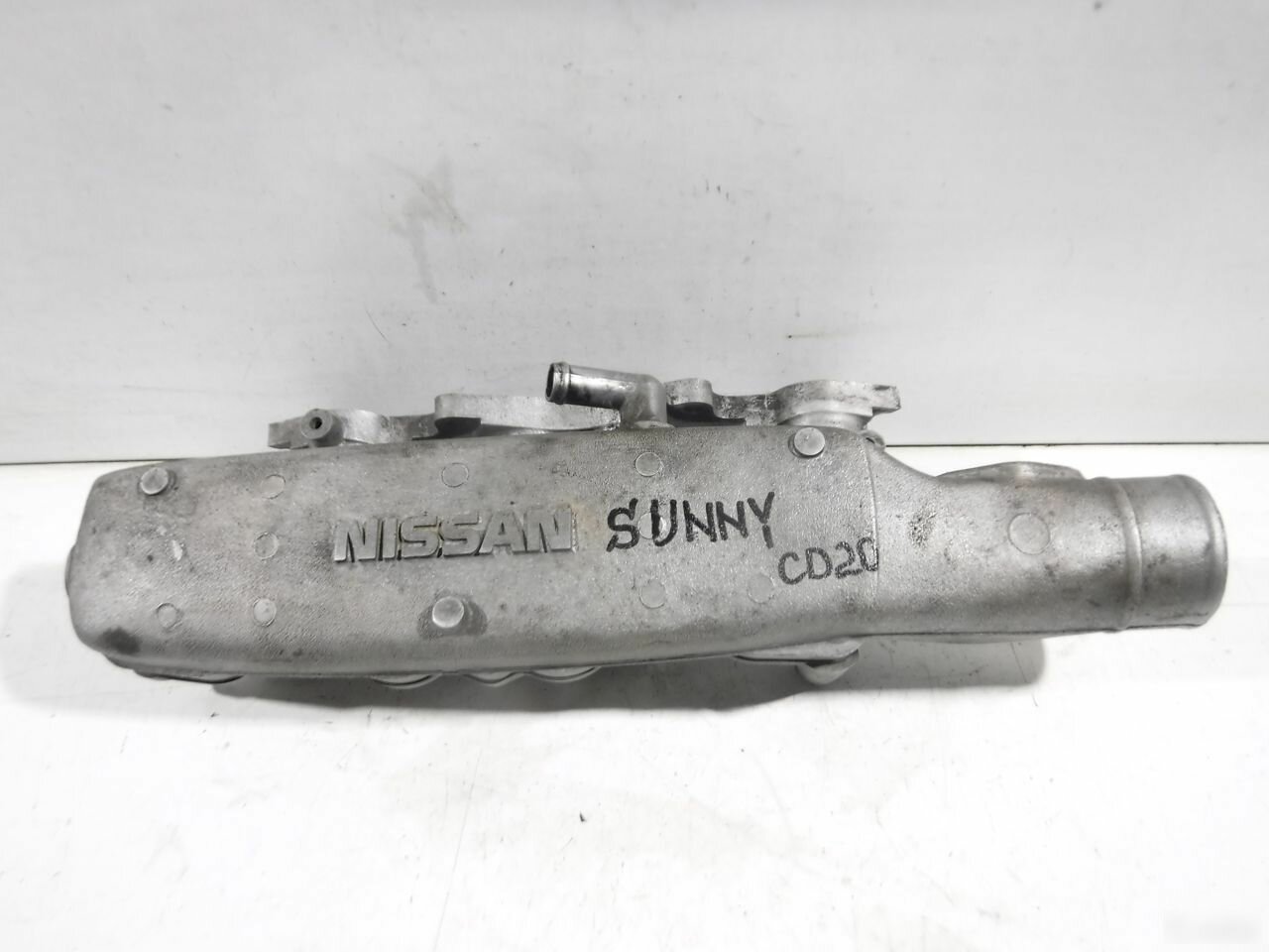 Коллектор впускной Nissan Sunny Y10 (1990—2000) 1400357J00