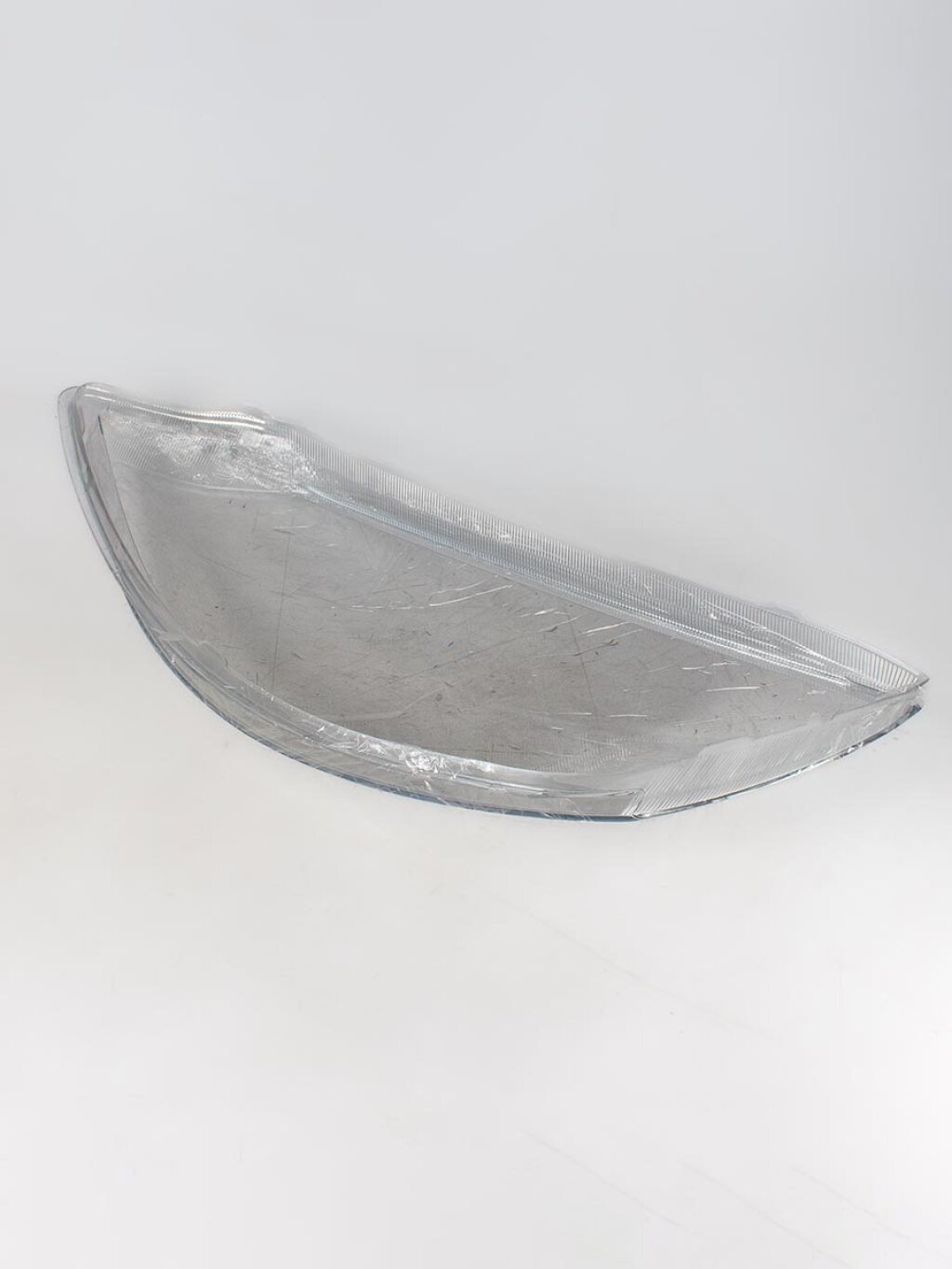 Стекло фары 2192 (правое) "BOSCH" (пластик)