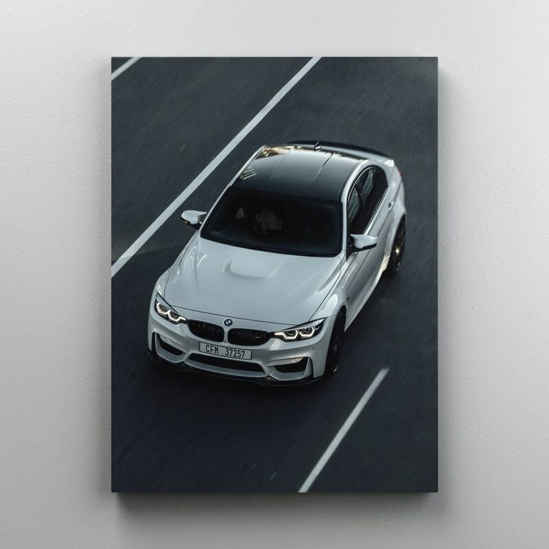 Интерьерная картина на холсте "Белый автомобиль BMW M 3 на дороге" размер 22x30 см