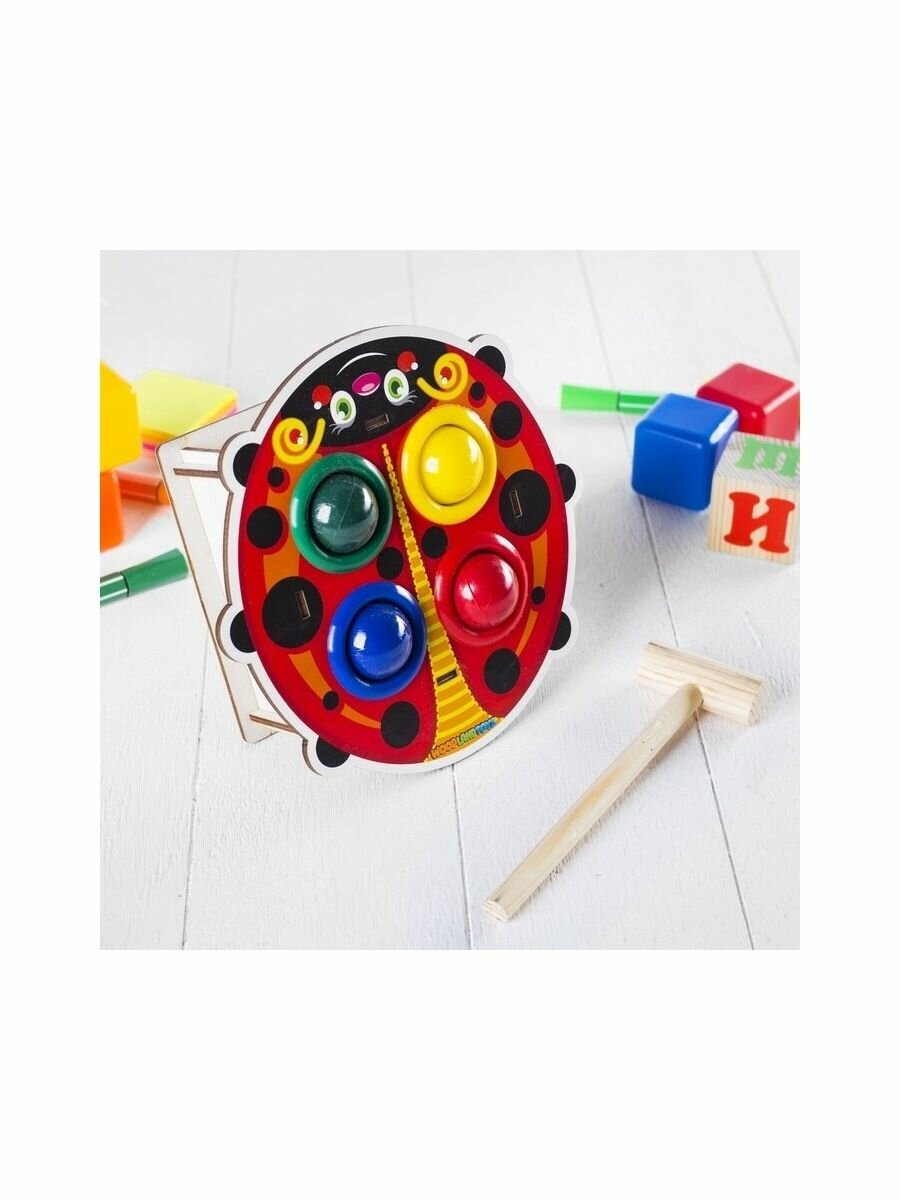 Стучалка WoodLand Toys цветная Божья коровка (115303)