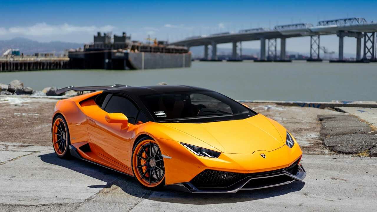 Картина на холсте 60x110 LinxOne "Lamborghini Huracan Оранжевый" интерьерная для дома / на стену / на кухню / с подрамником