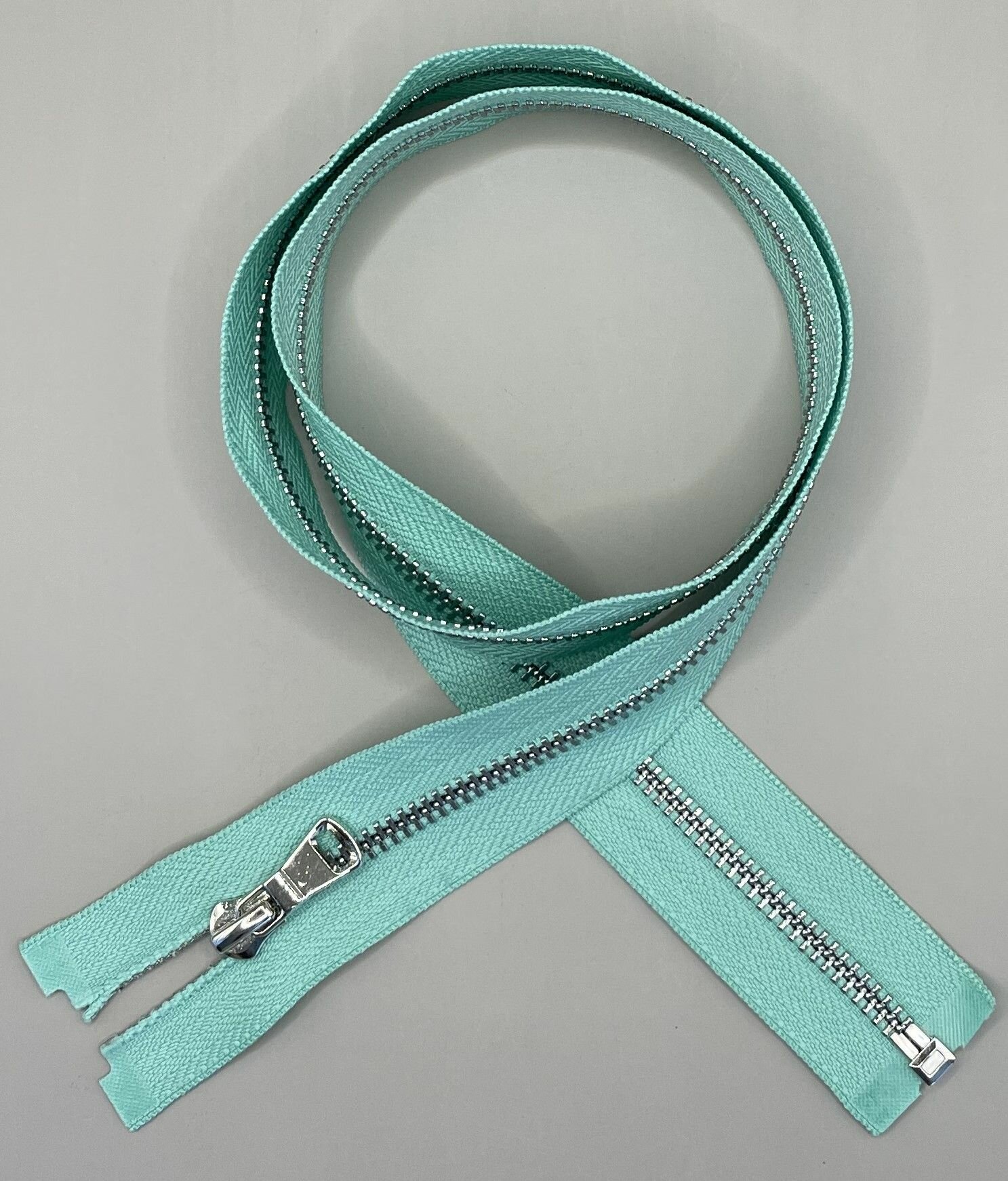 Молния(титан-легкий металл) , тип 5,80см, мятный, зубья серебро,1 замок.1шт.