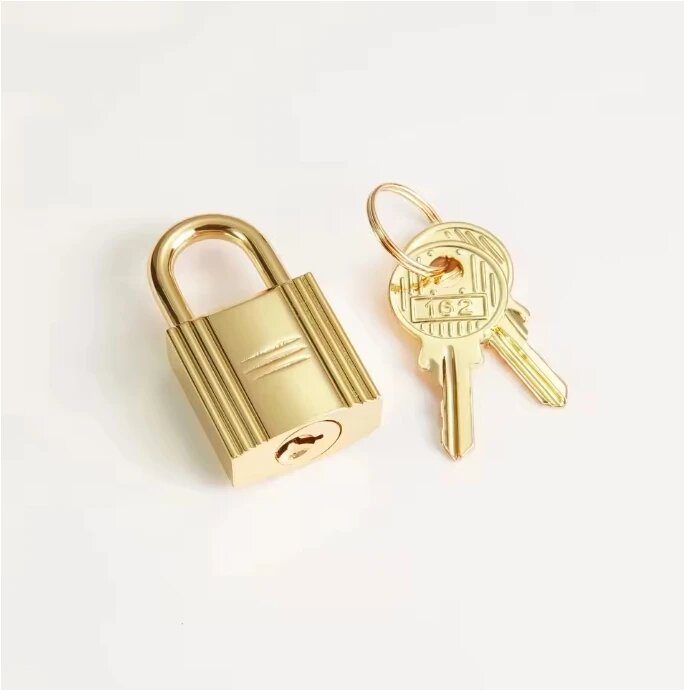 Замок для сумки Hermès, цвет Gold