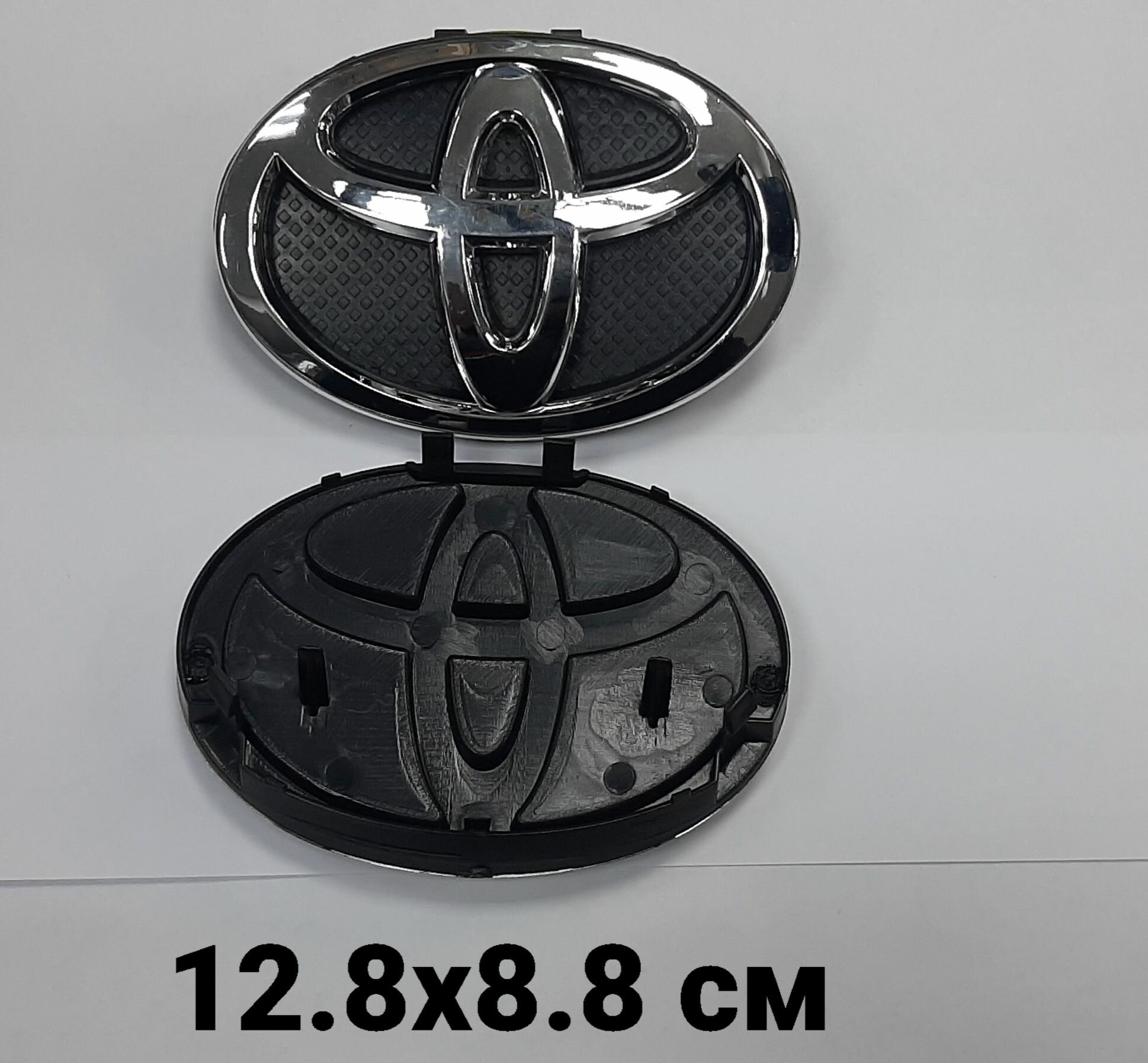 Эмблема Toyota Yaris Belta передняя 75301-52080