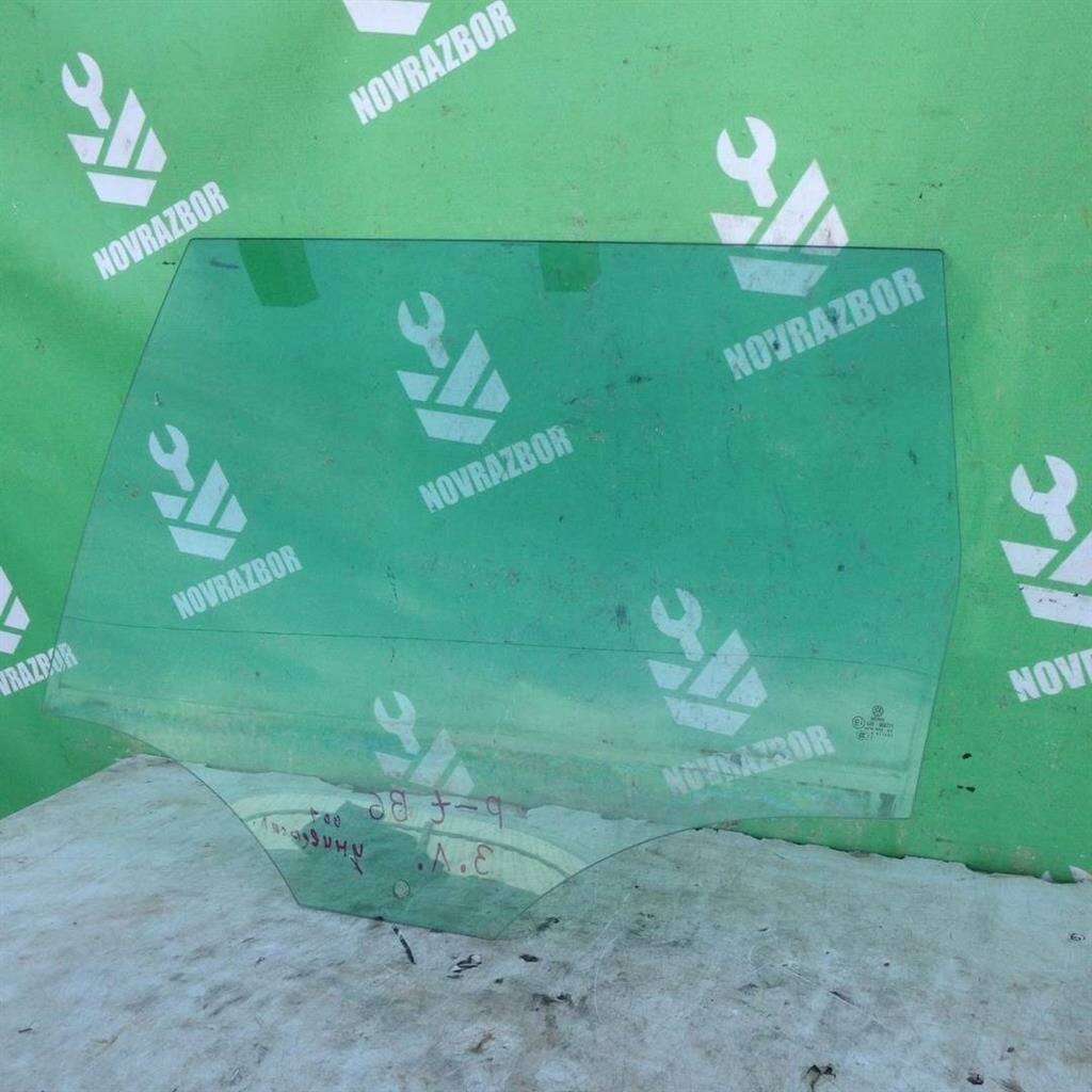 Стекло двери задней левой VW Passat B6 05-10