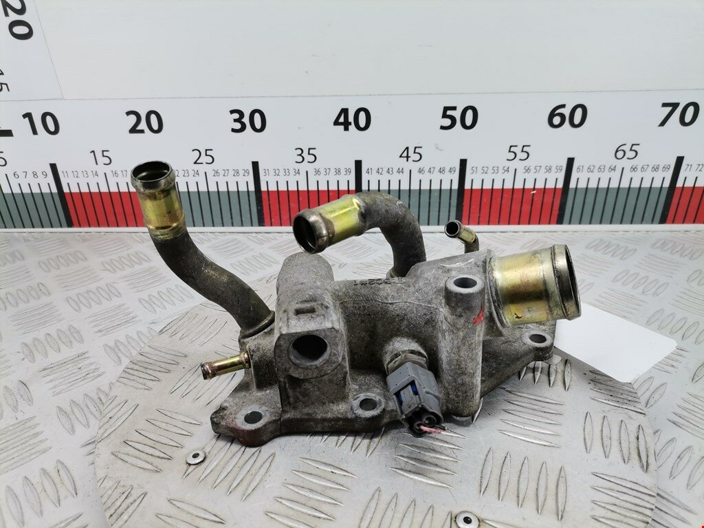 Корпус термостата Nissan Note (E11) 13049ED01A арт. 1968942