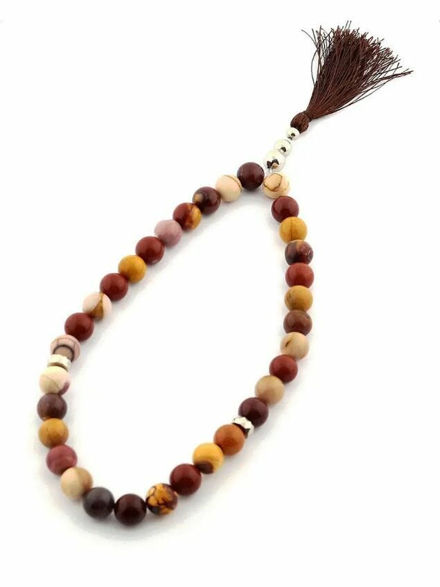 Четки из камня мукаид 33 бусины, диаметр бусины 12 мм.