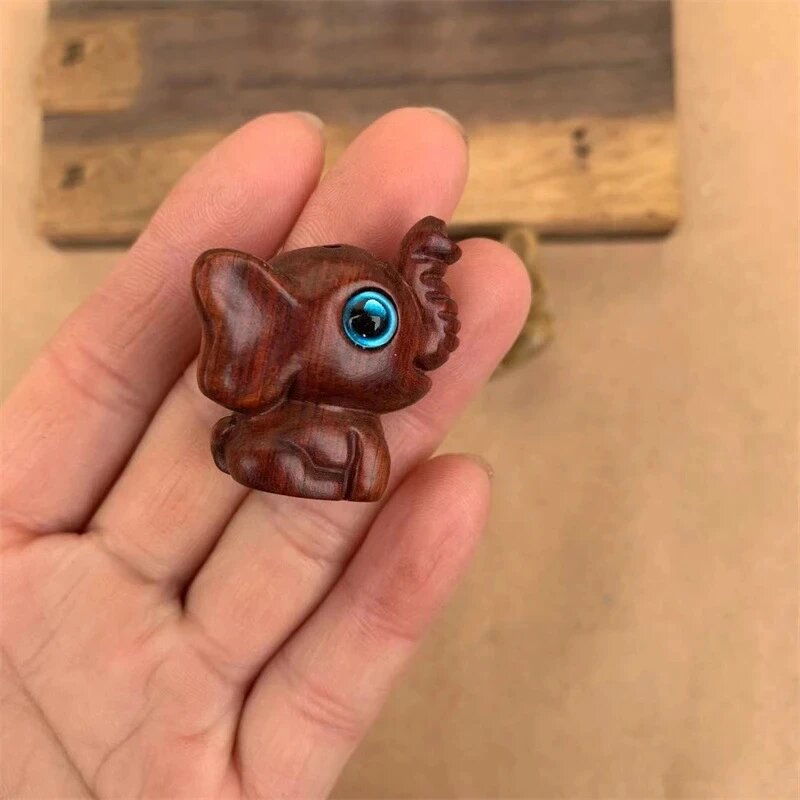 Деревянная статуэтка слоника, 34x29x20mm