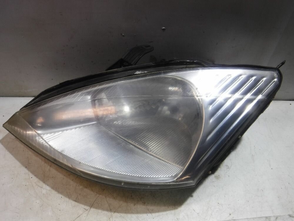 Фара левая Ford Focus I 4311144LLDEM